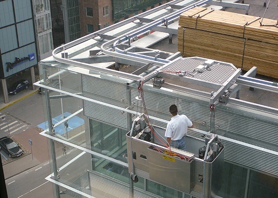 Light roof trolley system – Smart non-visible facade access solution